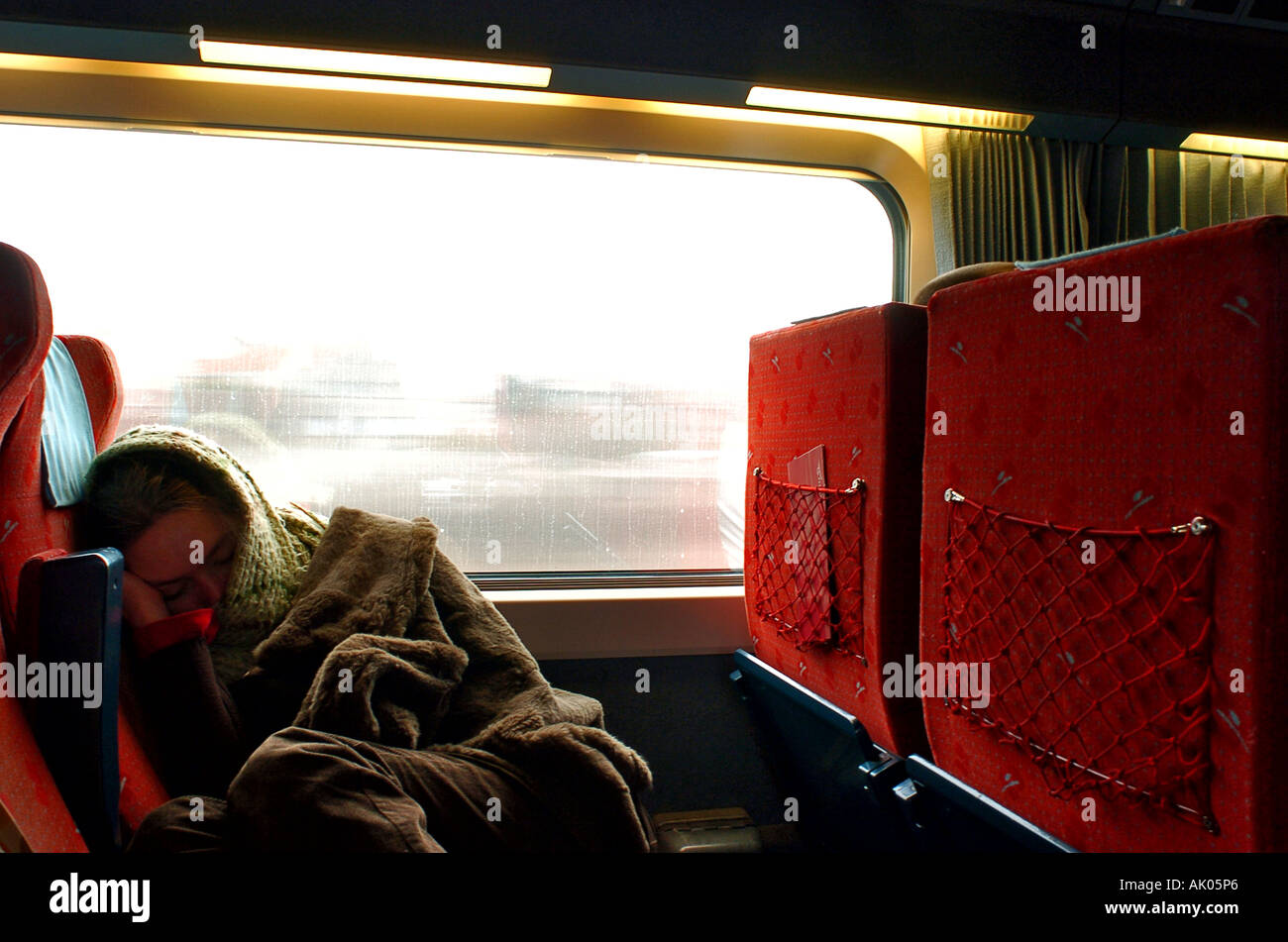 Sleeping train lady Stock Photo - Alamy