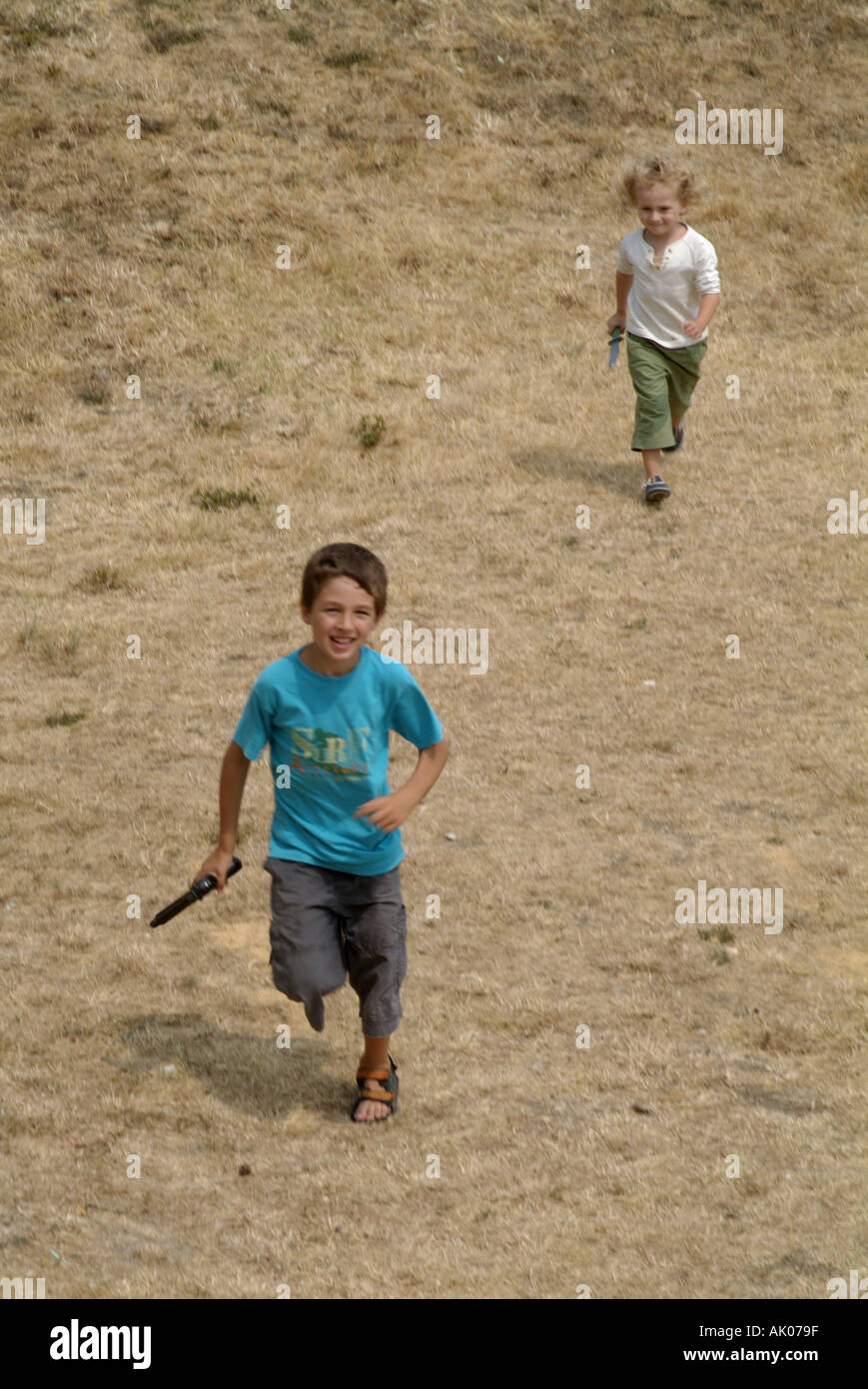 France Near Carcassonne Little Sister Running After Her Brother In A ...