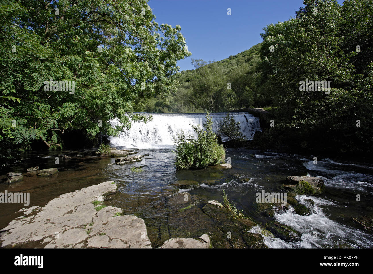 Weir on the river Wye at Monsal Dale Derbyshire Stock Photo - Alamy
