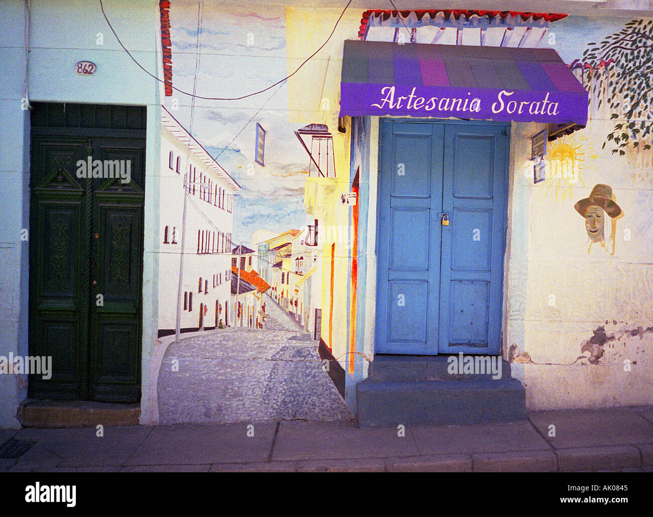 Colourful entrance way of artisan shop surrounded by artistic ...