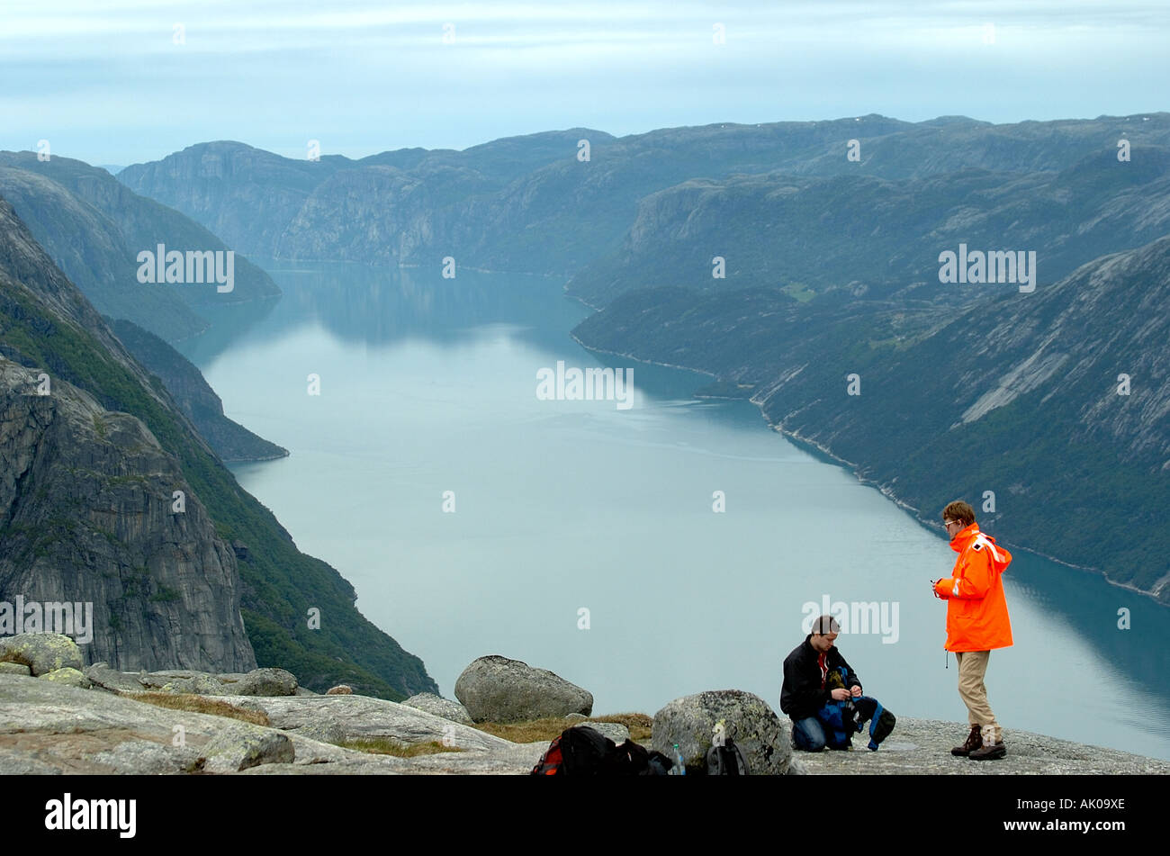 Base jump big cliff norway fjord extreme sport hi-res stock photography ...