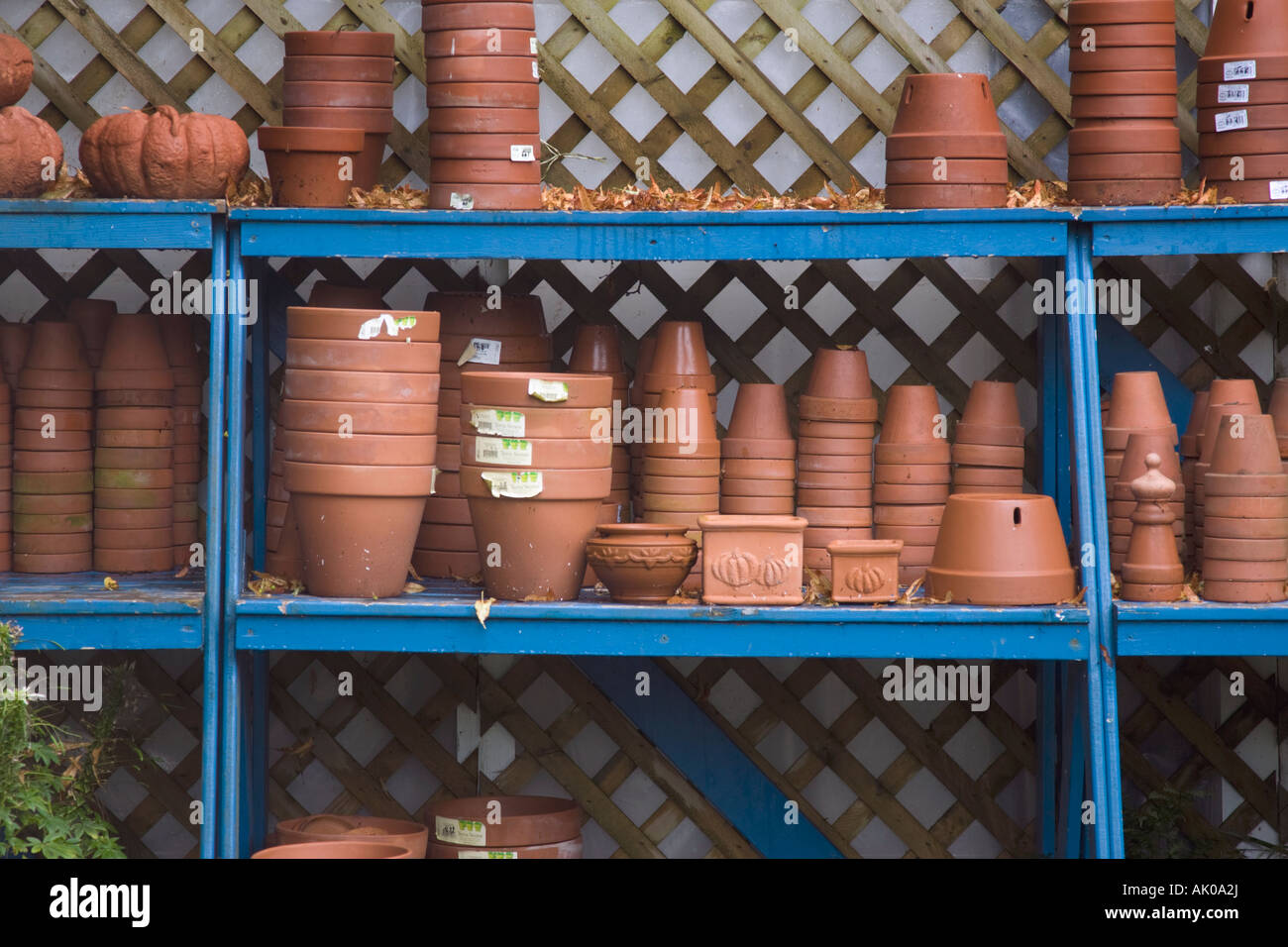 Clay pots on a rack Stock Photo - Alamy