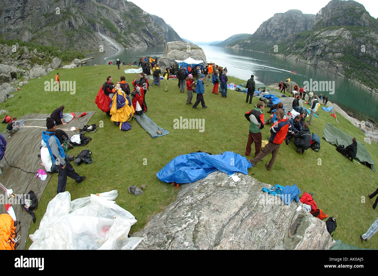Base jump big cliff norway fjord extreme sport hi-res stock photography ...
