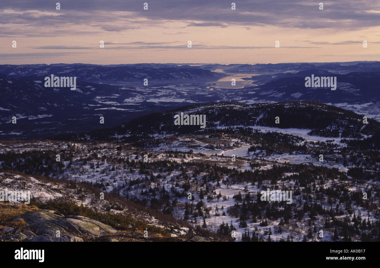 Winter landscape in setting sun with poor snow conditions in skiing ...