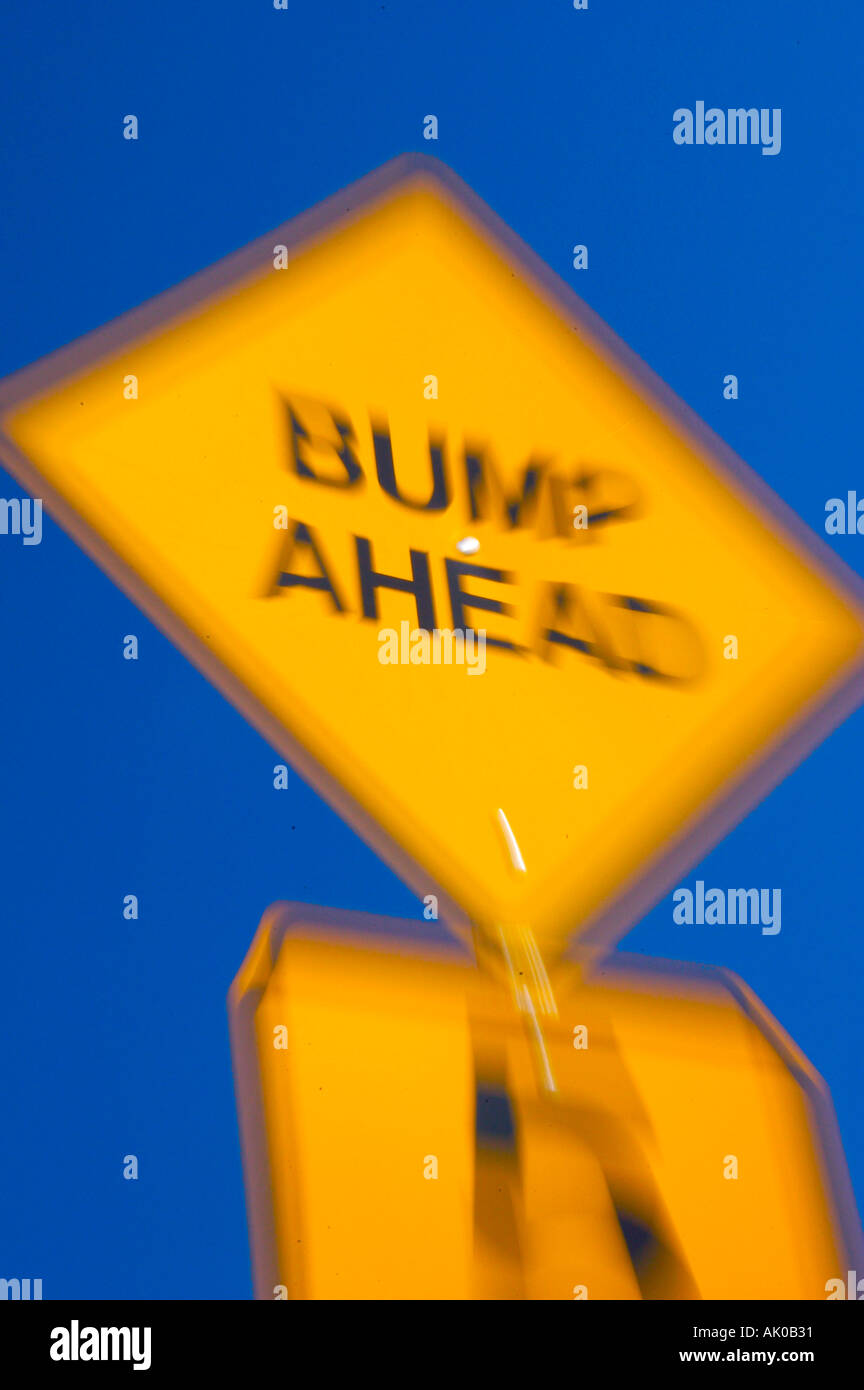 yellow street sign with blue sky background Stock Photo - Alamy