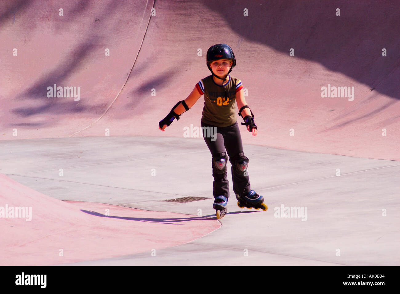 girl roller blading Stock Photo - Alamy