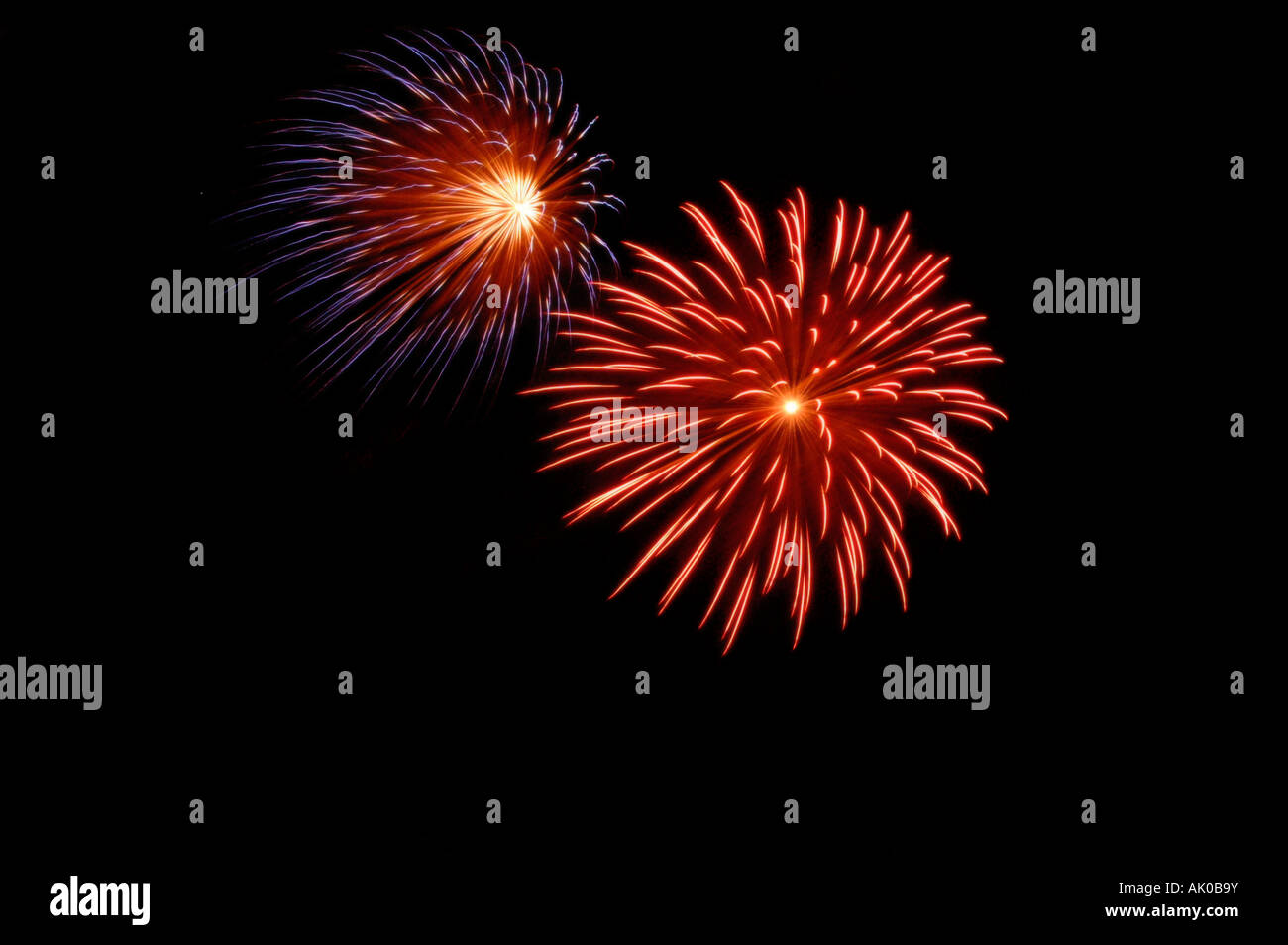 Two bursts of fireworks on the fourth of July burst celebration ...
