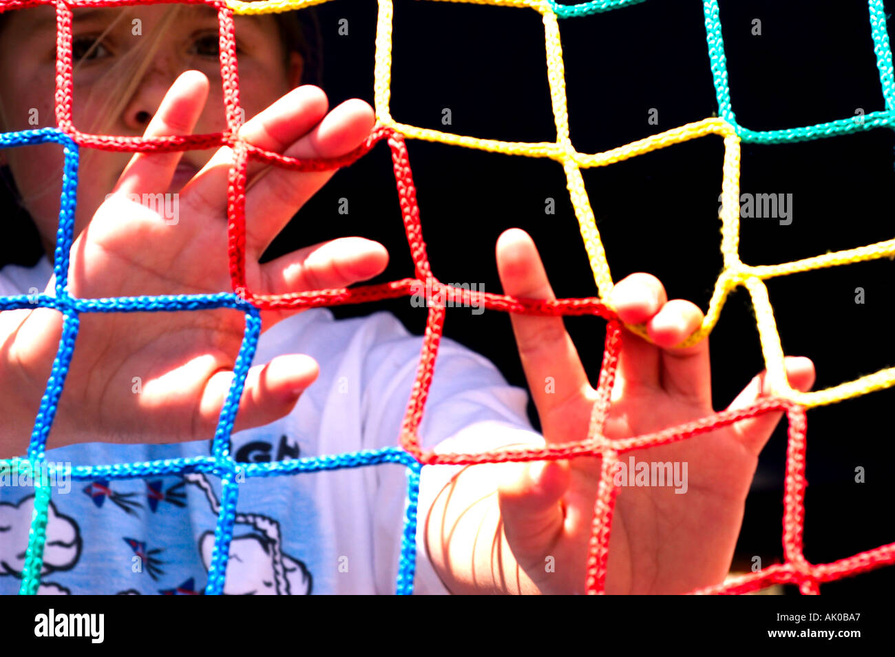 hands in net Stock Photo - Alamy