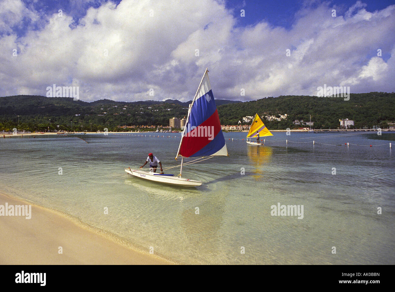 Small sunfish sailboats on a popular beach in Ocho Rios Jamaica Stock ...