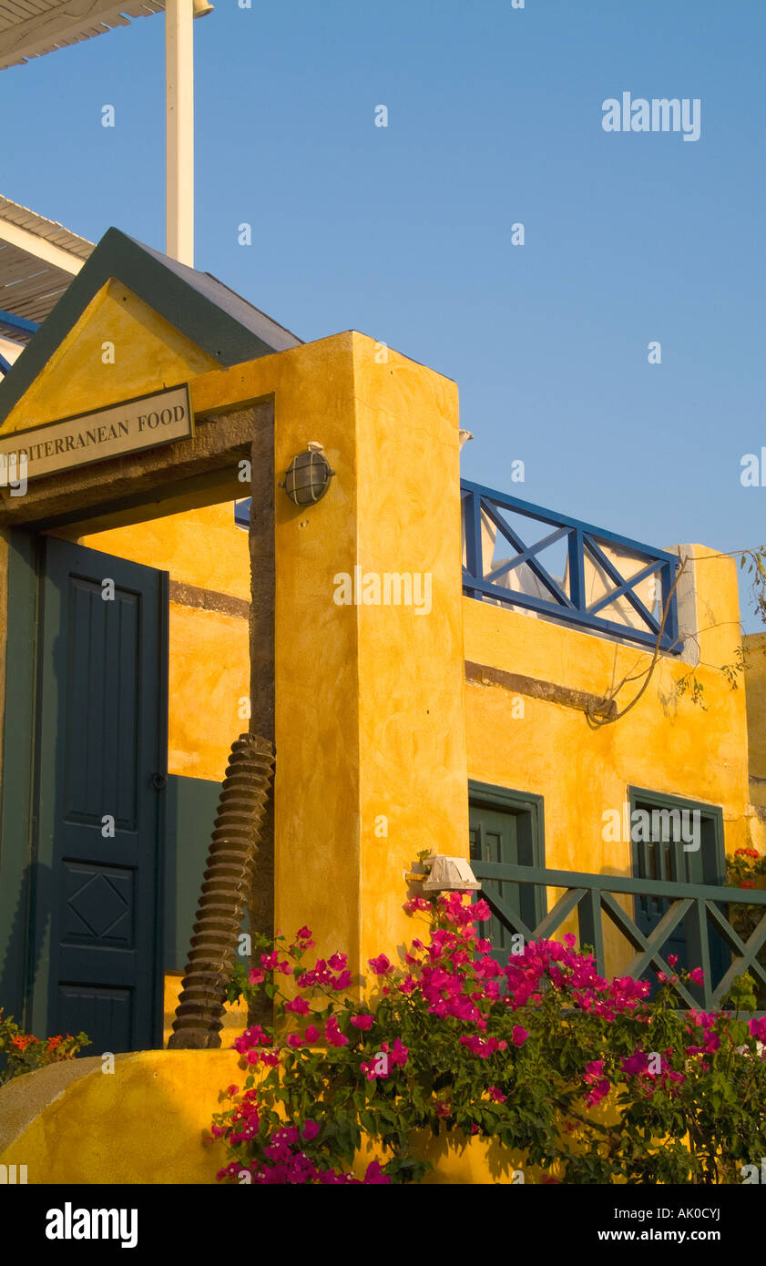Oia Santorini Greece and a colorful yellow building Stock Photo - Alamy