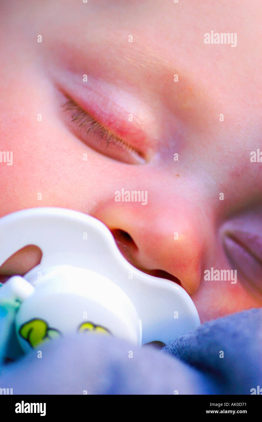 sleeping baby with pacifier Stock Photo - Alamy