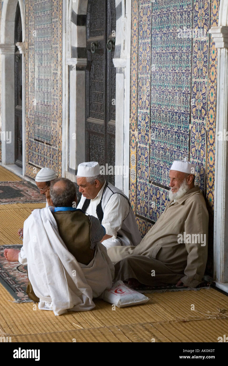 Tripoli, Libya. Old Men Talking, Karamanli Mosque, 18th Century Stock ...