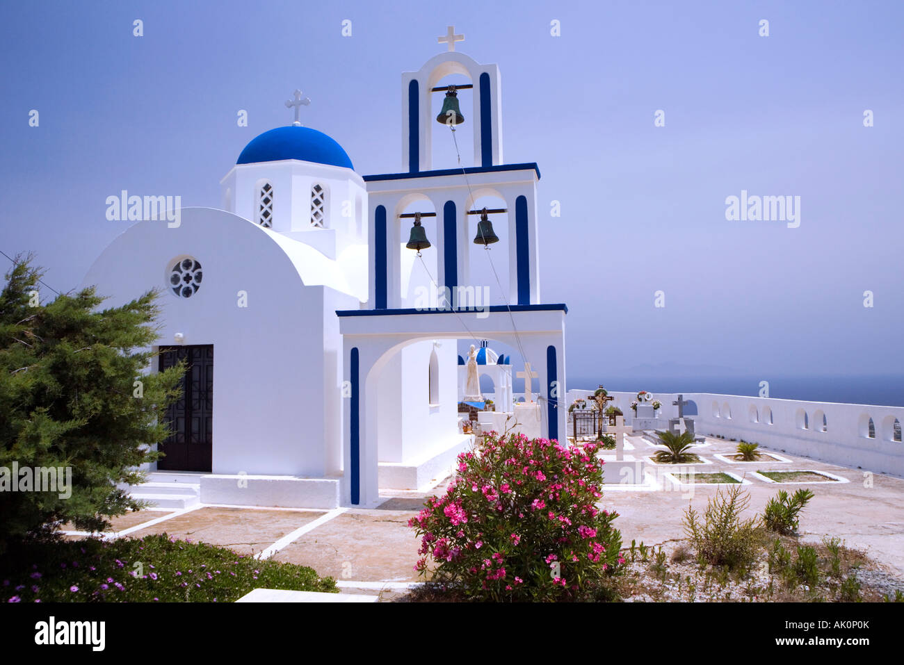 One of the many pretty little churches in Santorini Greece Stock Photo ...