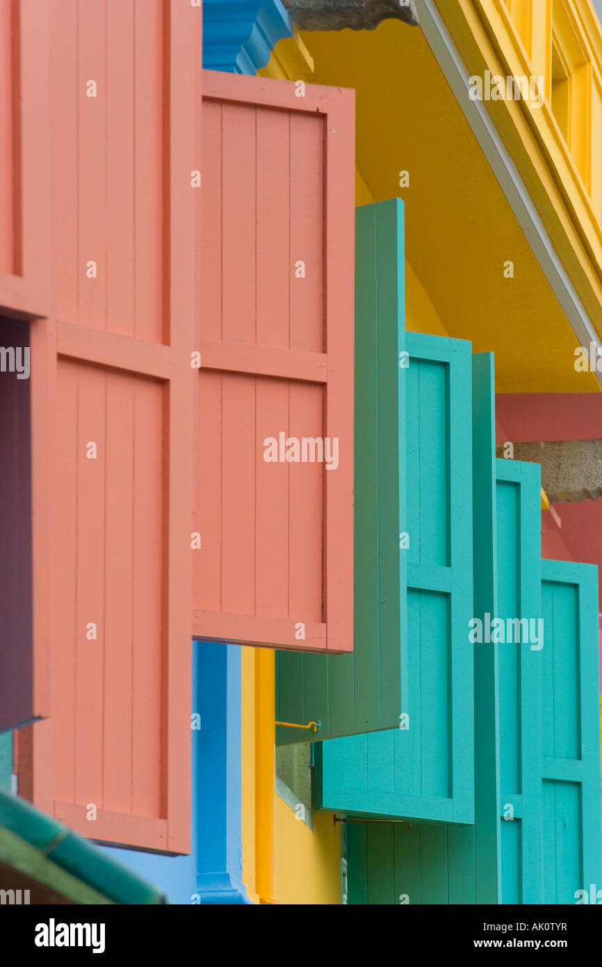 Colourful window shutters on restored traditional Chinese buildings on ...