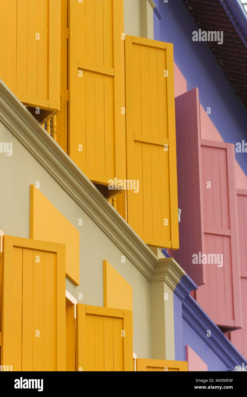 Colourful window shutters on restored traditional Chinese buildings on ...