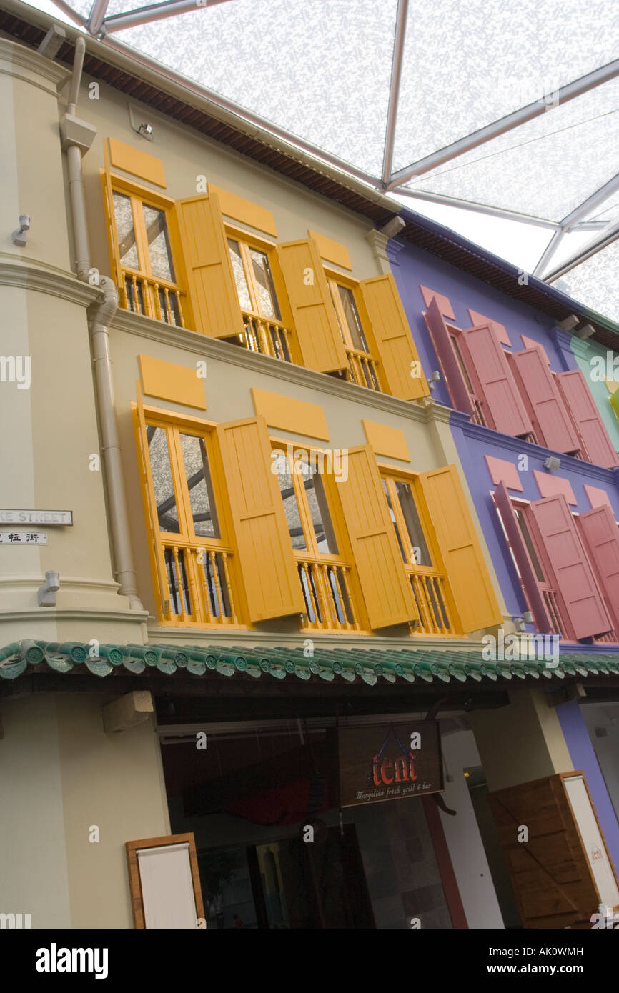 Colourful window shutters on restored traditional Chinese buildings on ...