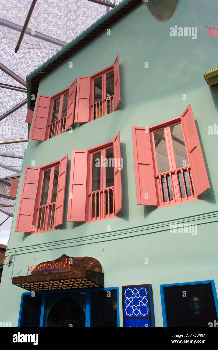 Colourful window shutters on restored traditional Chinese buildings on ...