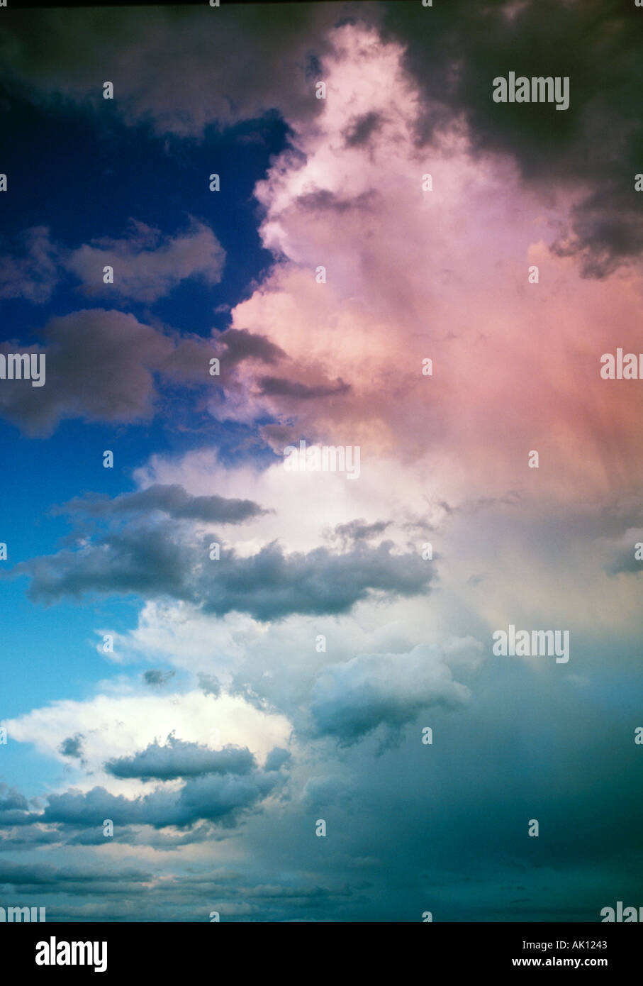 Colorful puffy clouds in blue sky Stock Photo - Alamy