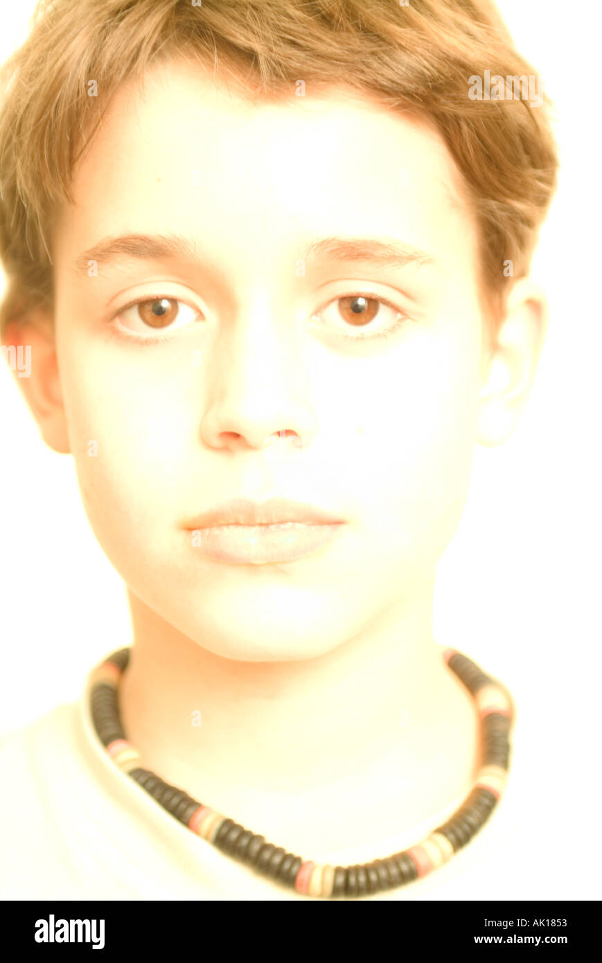 Boy model released wearing beads Stock Photo - Alamy
