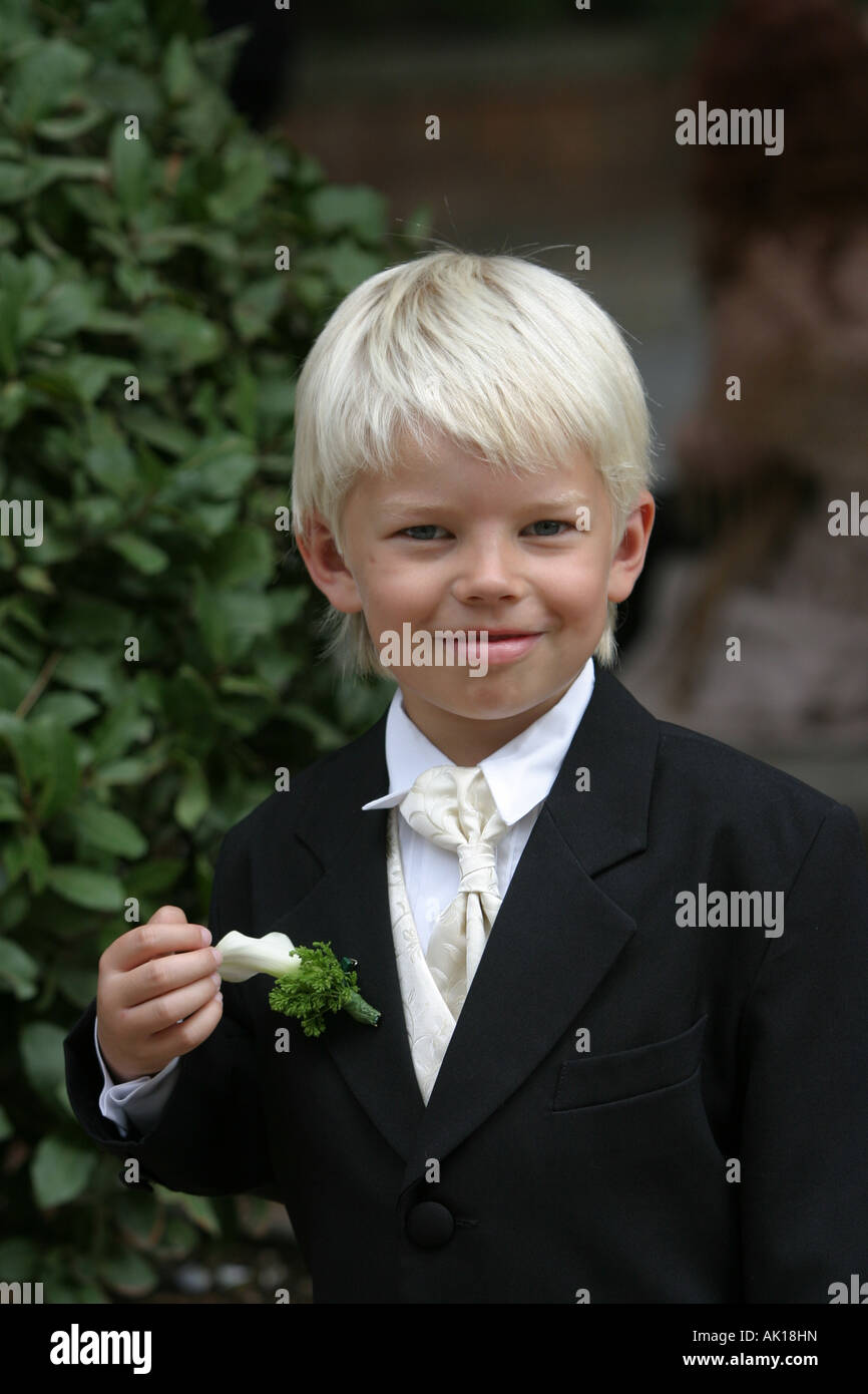 Norwegian happy young boy blond hair and elegant dress Stock Photo - Alamy