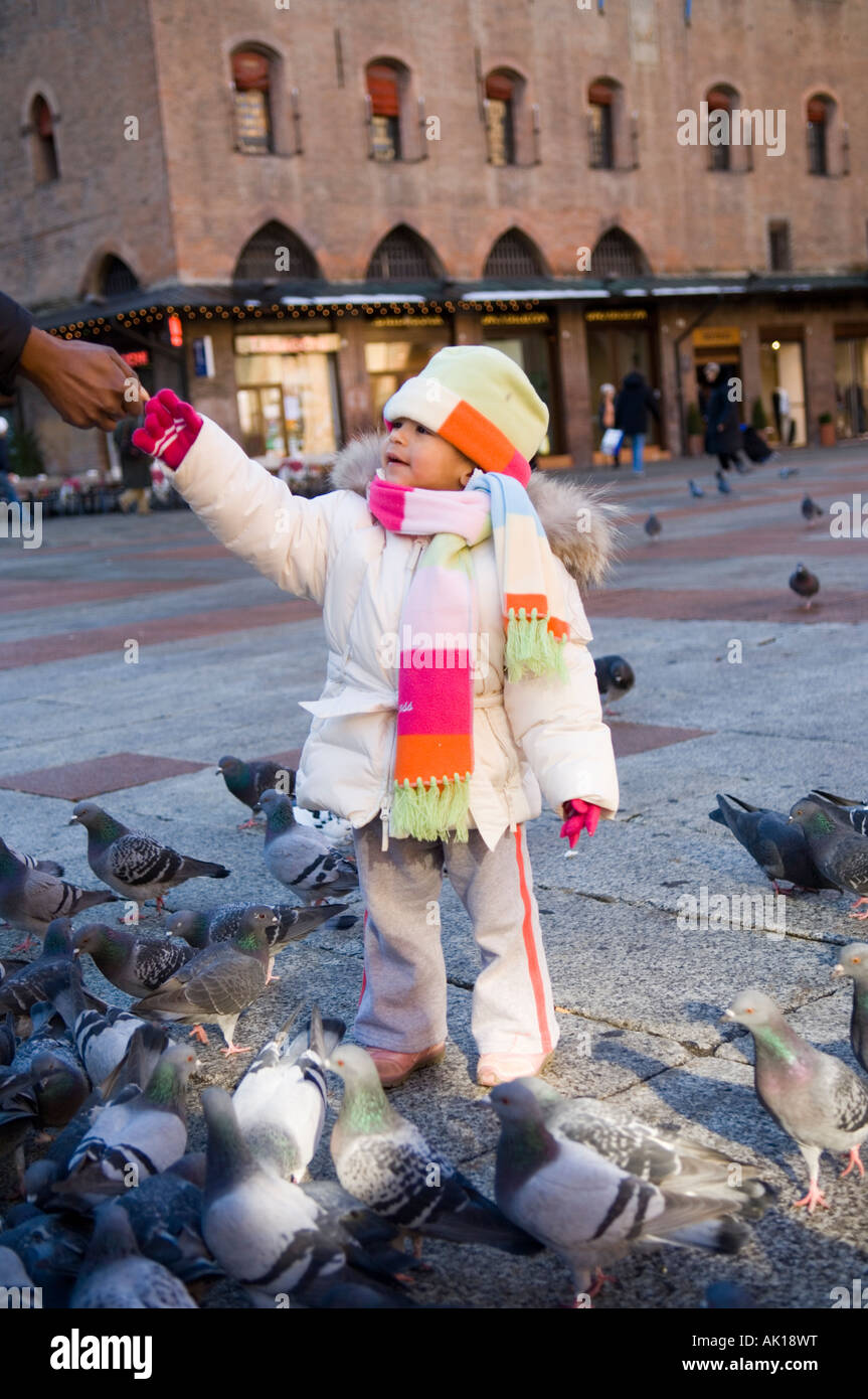 Girl with Pigeons, Piazza Maggiore, Bologna, Italy Stock Photo - Alamy