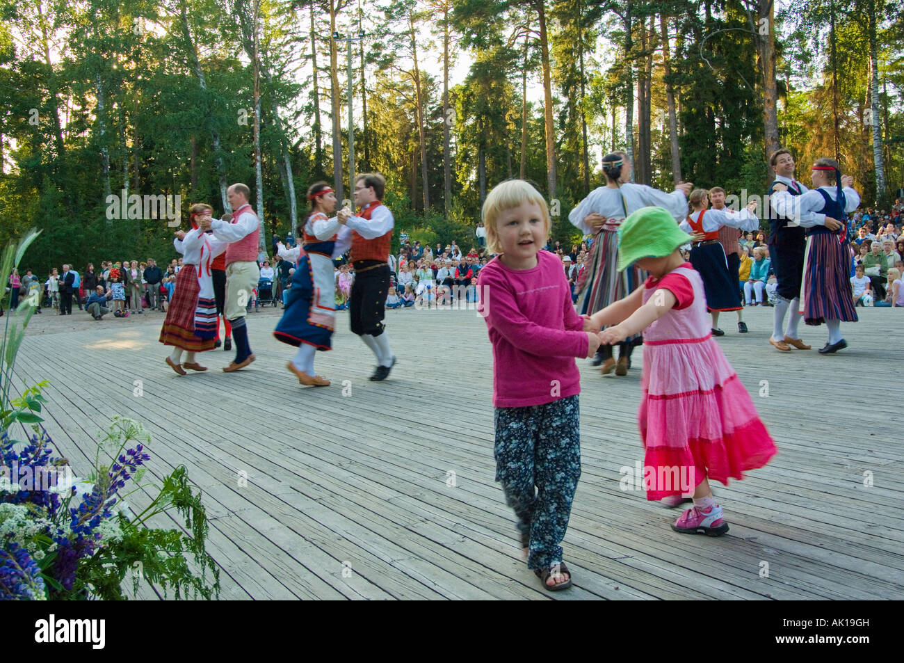 Young children join in folk dancing during traditional Midsummer ...