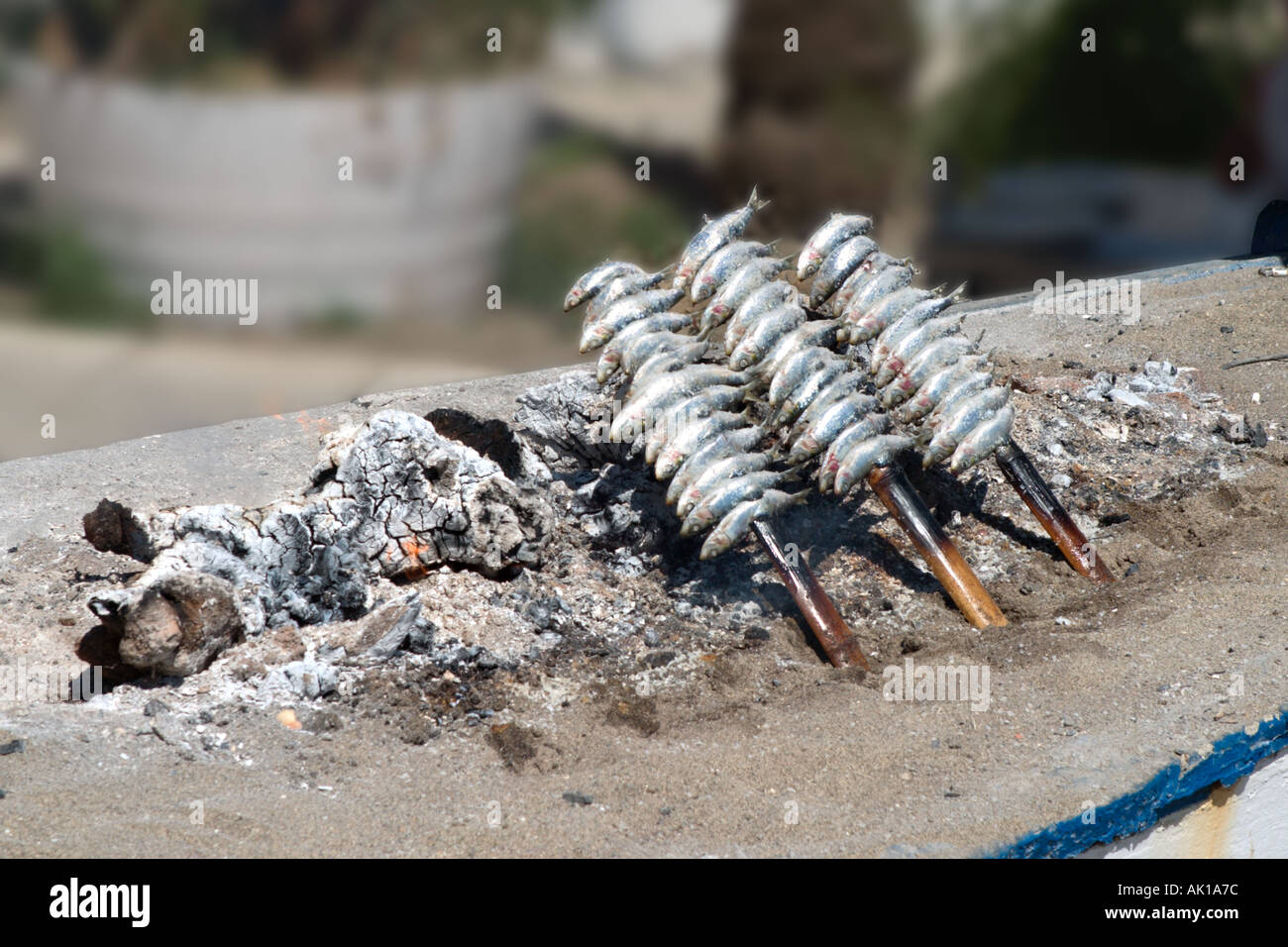 Fish on open fire front hi-res stock photography and images - Alamy