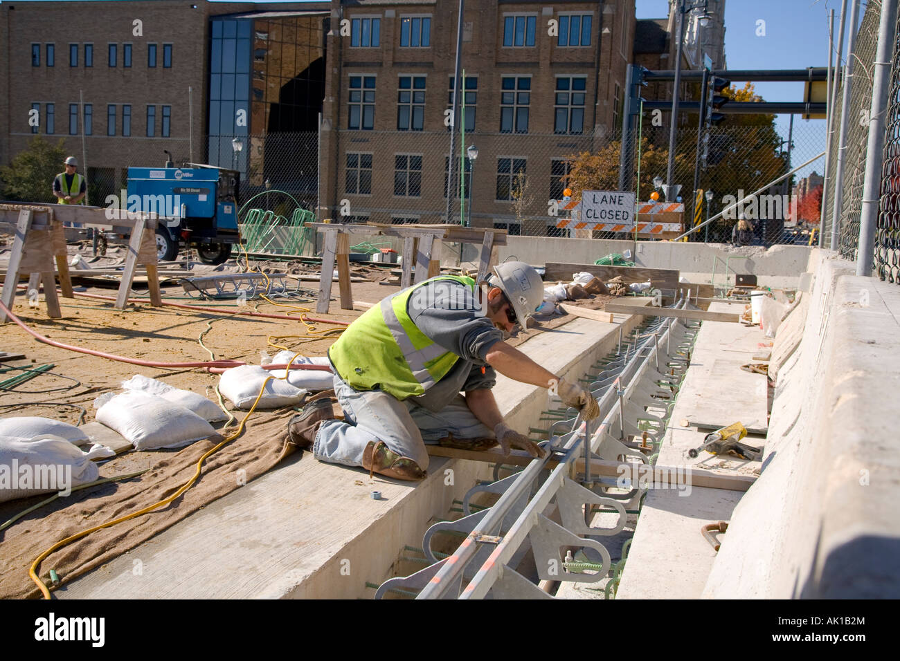 construction worker wearing a hard hat working on a job site in ...