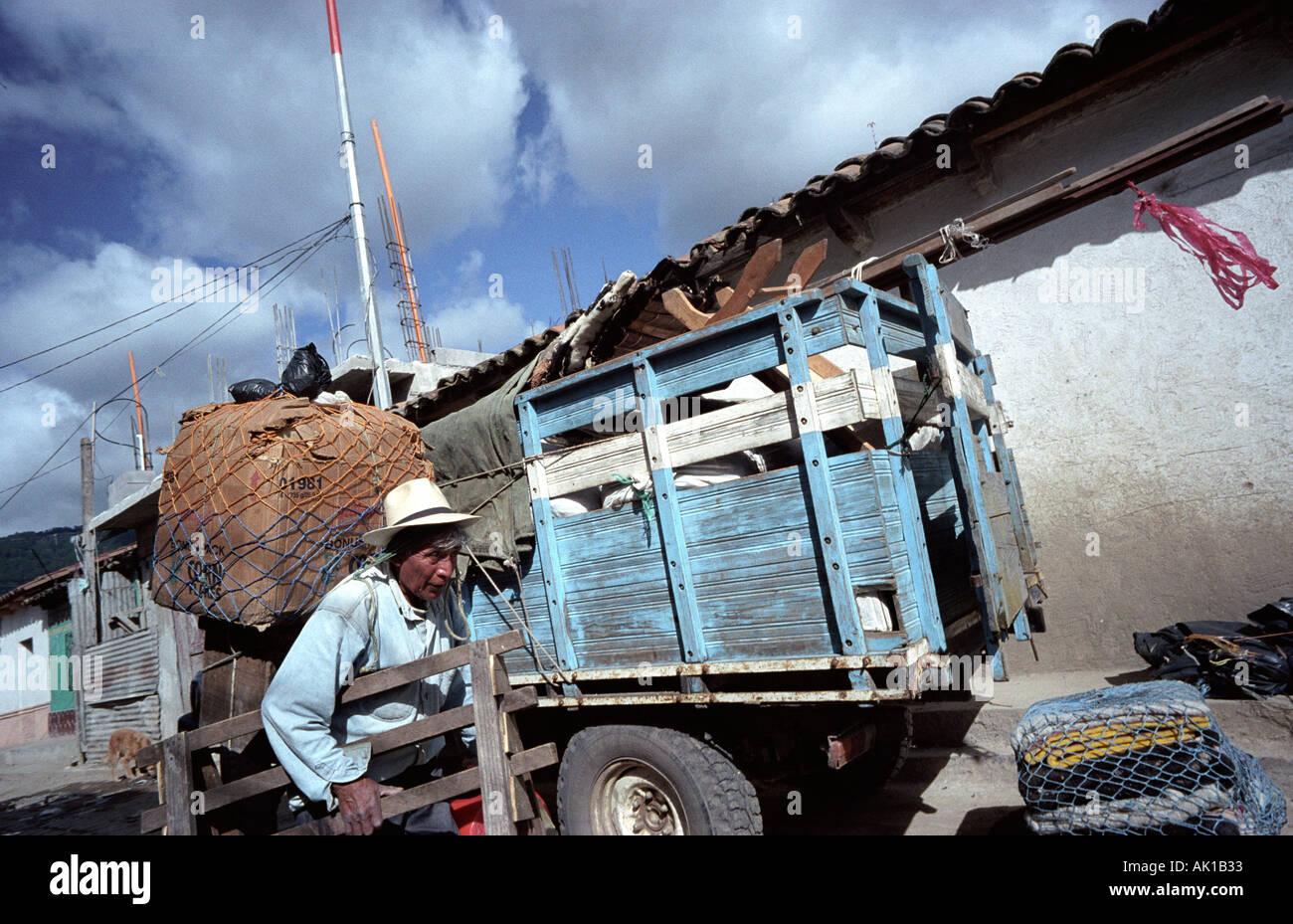 Man carrying heavy load in San Martin Chimaltenango Guatemala Stock ...