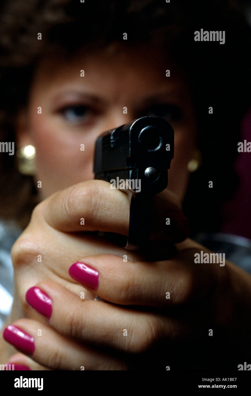 Angry woman gun hi-res stock photography and images - Alamy