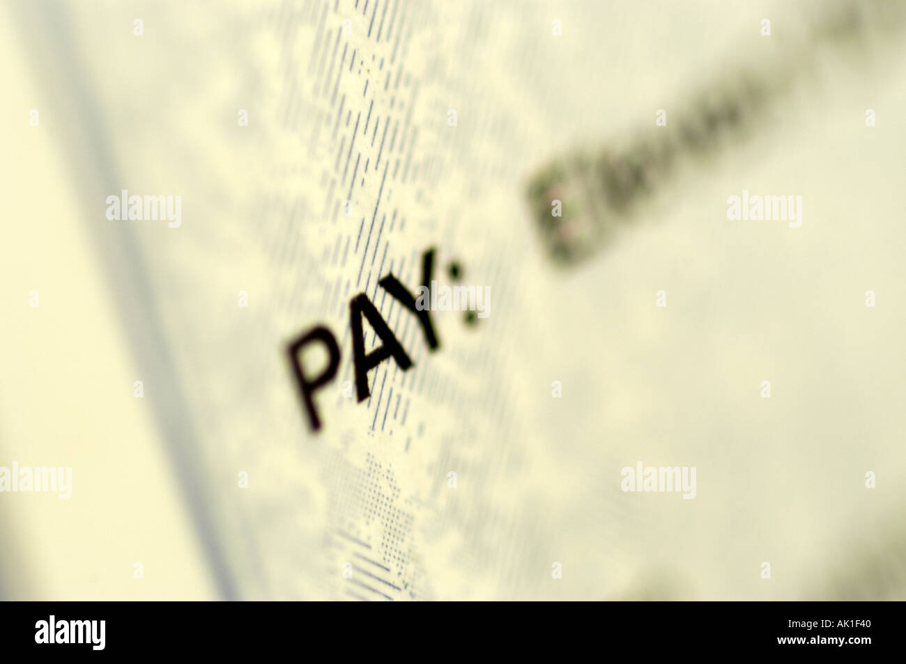 PAY cheque check partial horizontal Stock Photo - Alamy