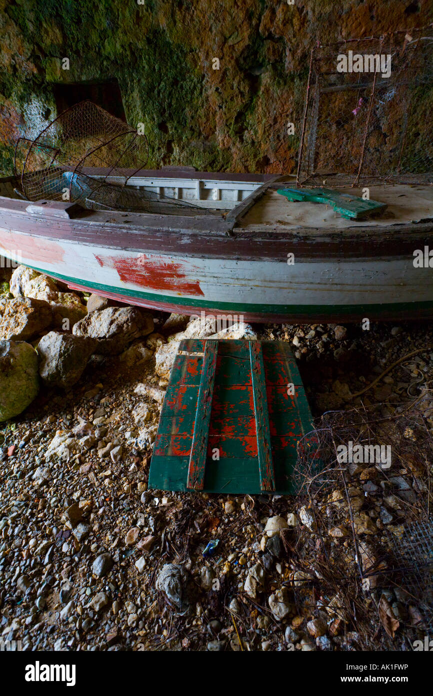 Rotten wooden boat in underground shelter Stock Photo - Alamy
