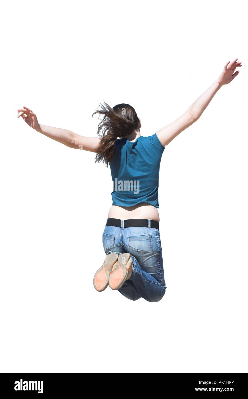 Joyful woman jumping Stock Photo - Alamy