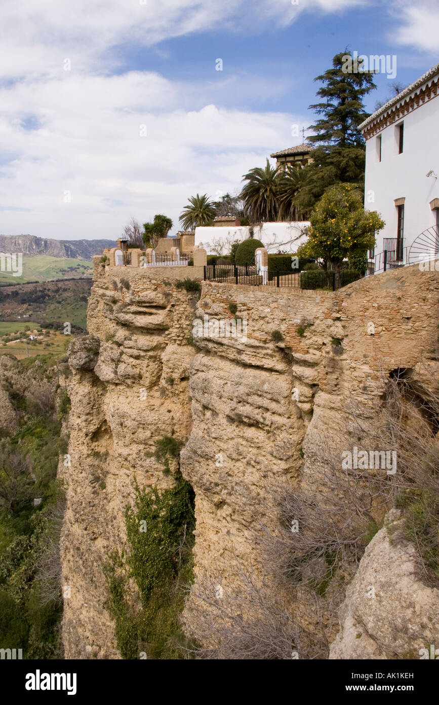 The cliff edge that protects the western flank of Ronda, Andalucia ...