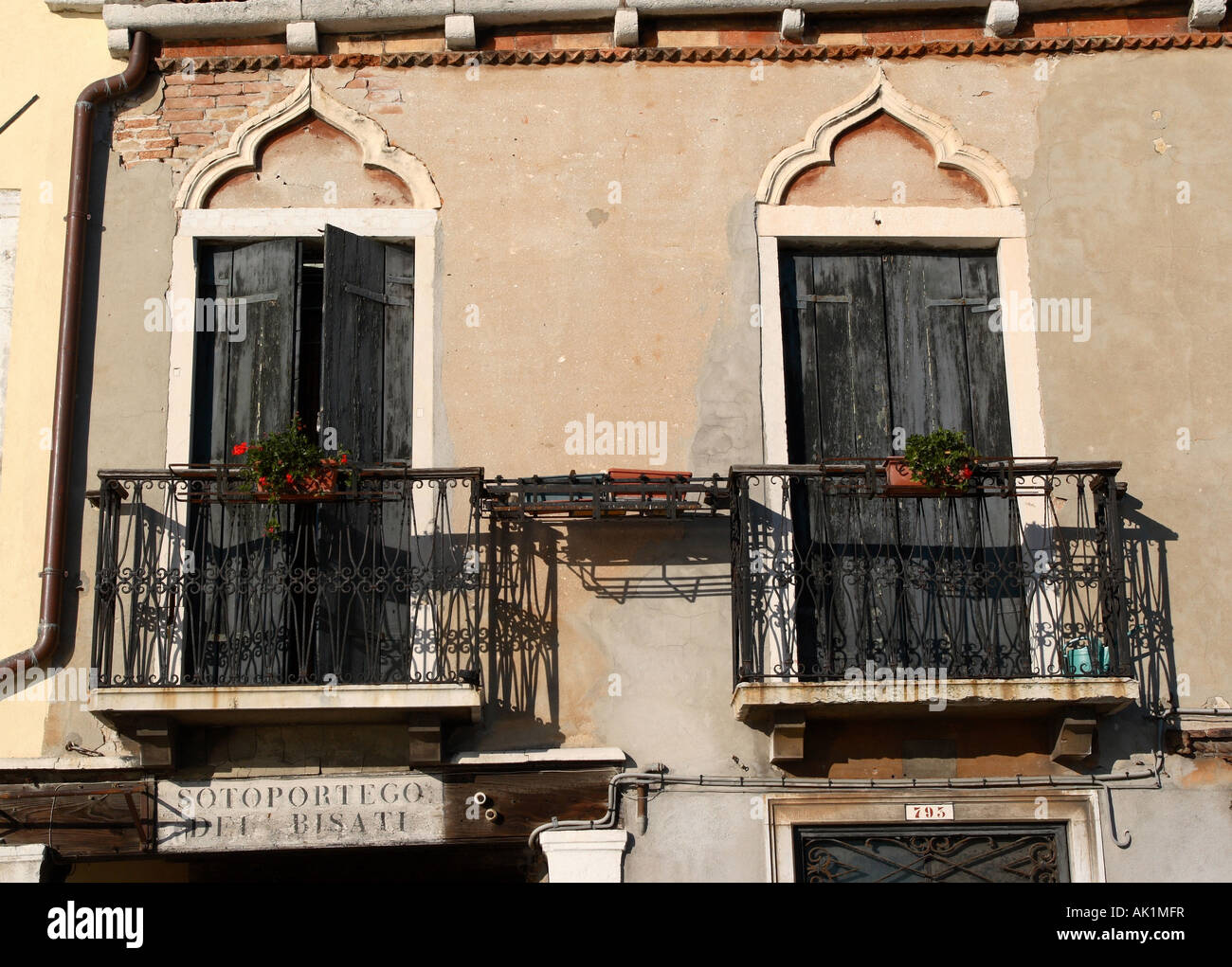 iron balconies on the waterfront in Venice Stock Photo - Alamy