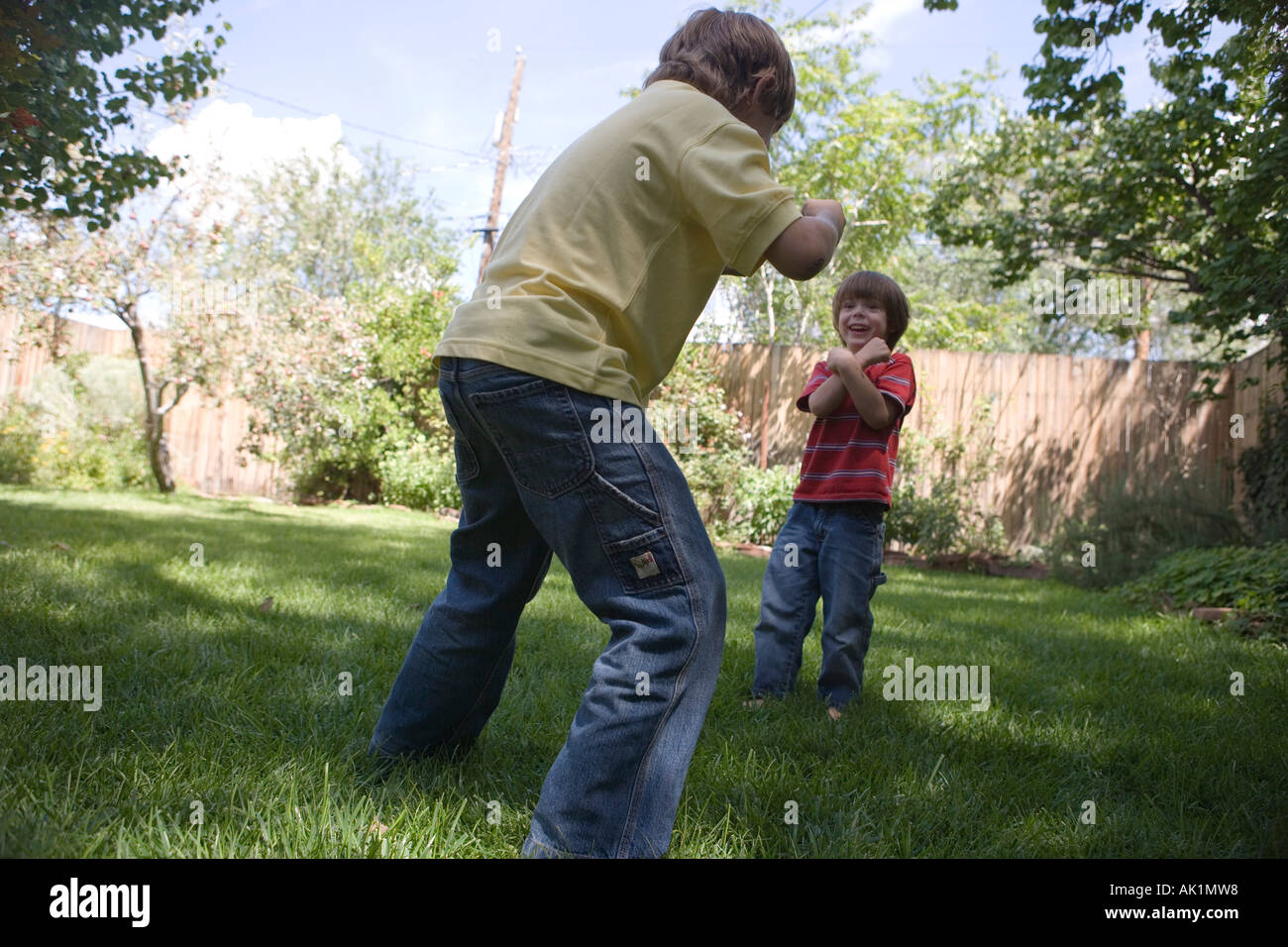 Boys play fight home hi-res stock photography and images - Alamy