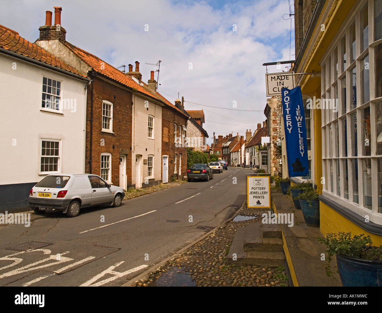 Main street in the picturesque village of Cley next the Sea Norfolk ...