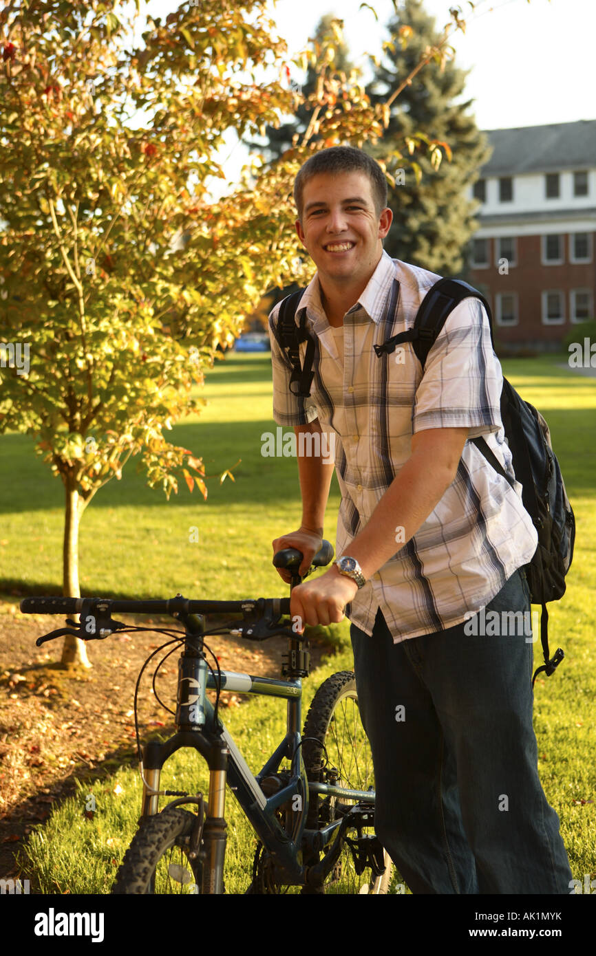 College student with bicycle Stock Photo - Alamy