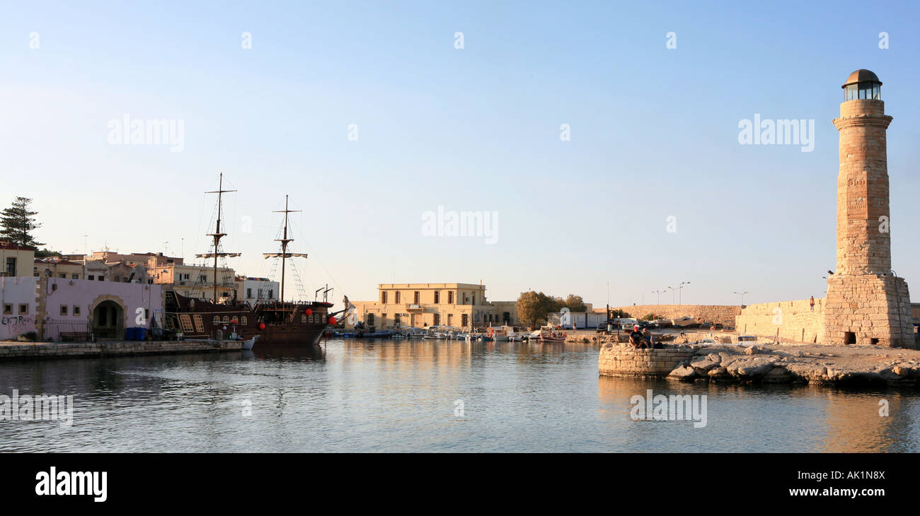 The old Venetian harbour at Rethymnon Crete with the lighthouse and a ...