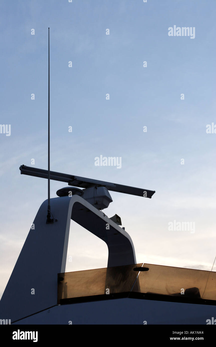 Detail of radar and radio antenna on motor boat Stock Photo - Alamy