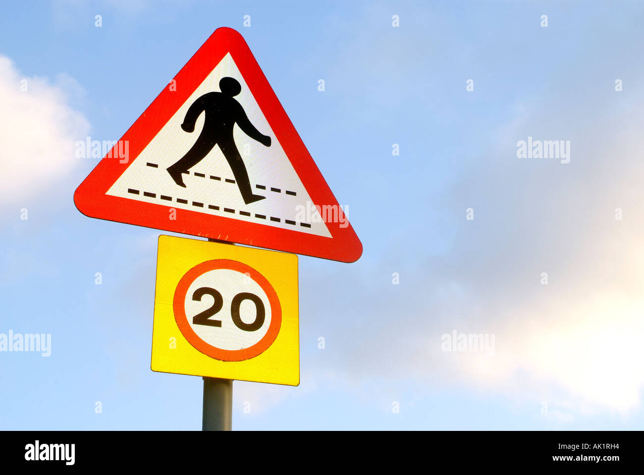 A road sign warning against pedestrians walking on crossings limits ...
