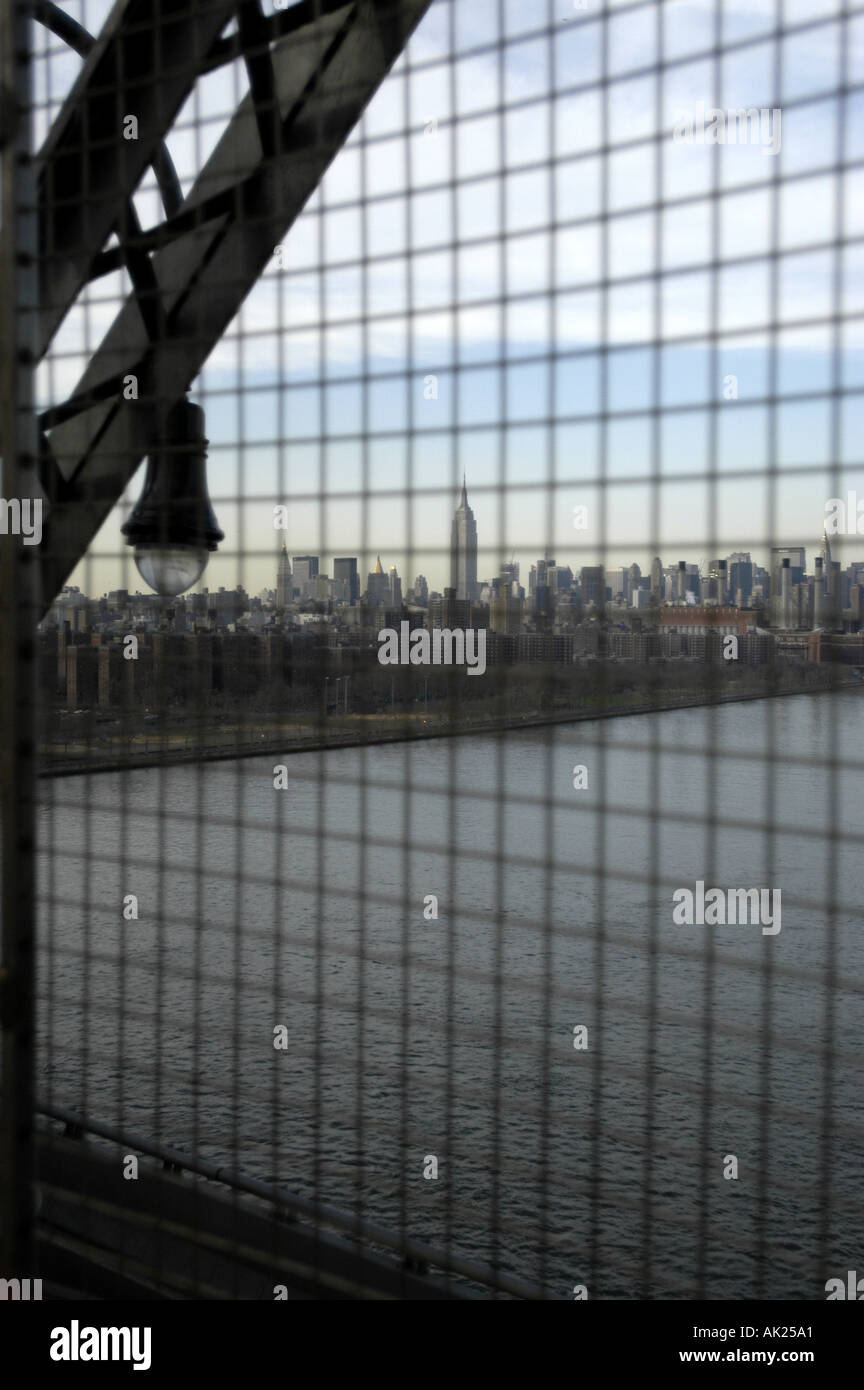 NY Cityscape wire view cage girders bridge horizontal Stock Photo - Alamy