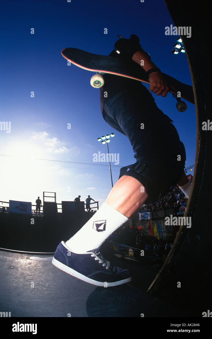 A skateboarder on top of a half pipe ramp Stock Photo - Alamy