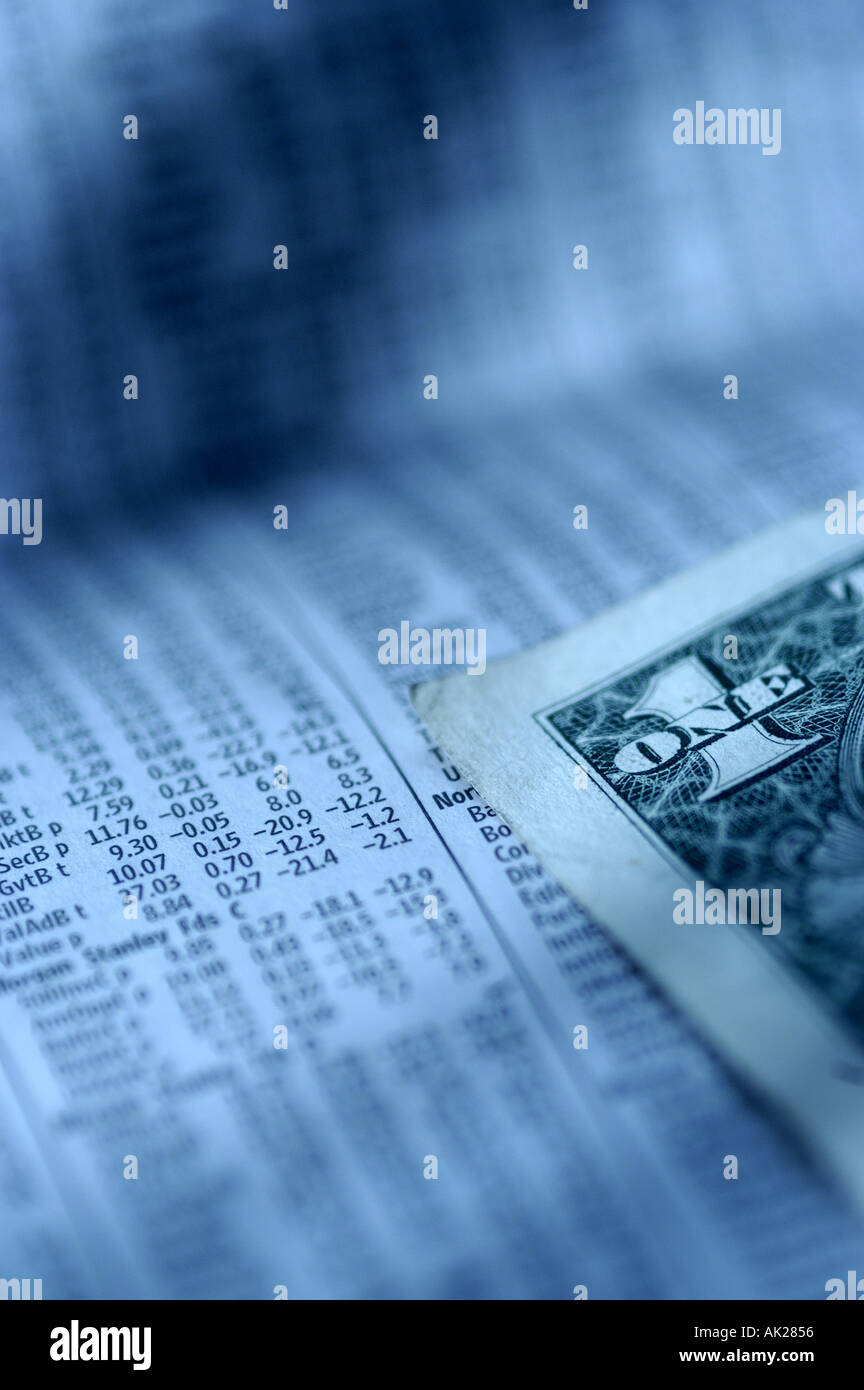 1 one dollar bill note corner on stock market page vertical Stock Photo ...
