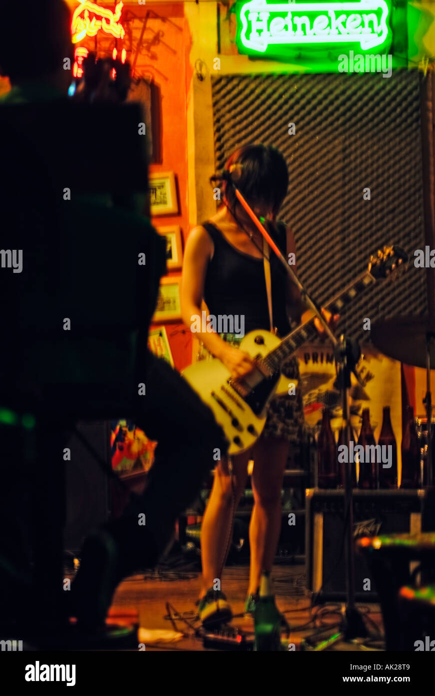 Chinese Girl Musician Playing Electric Guitar Performing In Pub Taiwan ...