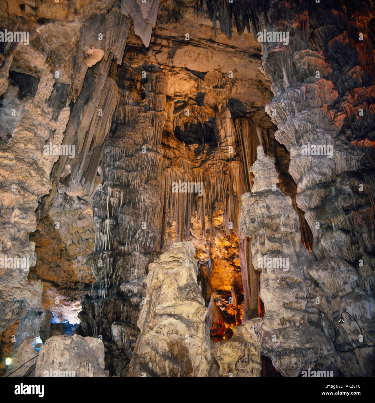 Stalactites and stalagmites spectacularly lit in the cool cathedral ...