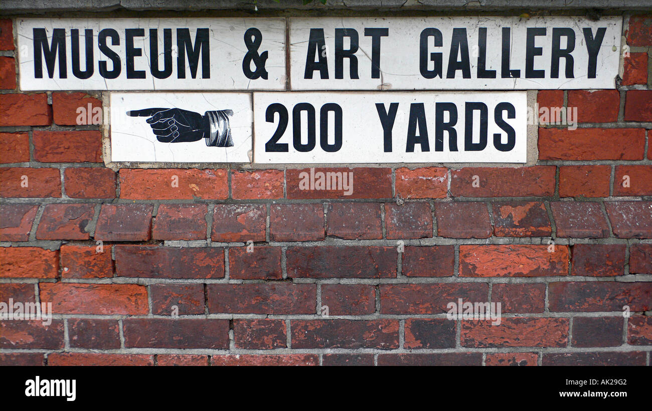 Victorian ceramic sign embedded in redbrick wall of Public street ...