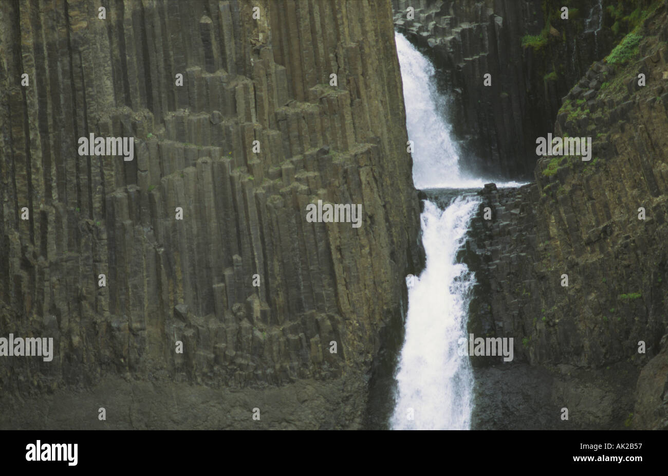 Canyon Waterfall Between Basalt Columns Iceland Stock Photo - Alamy