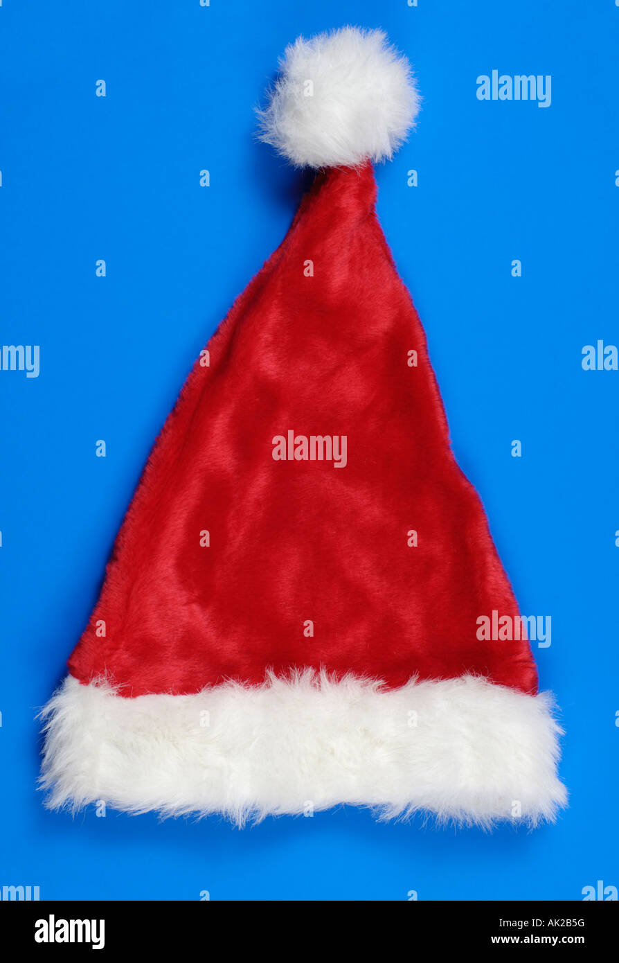 Red fluffy Christmas hat Stock Photo - Alamy