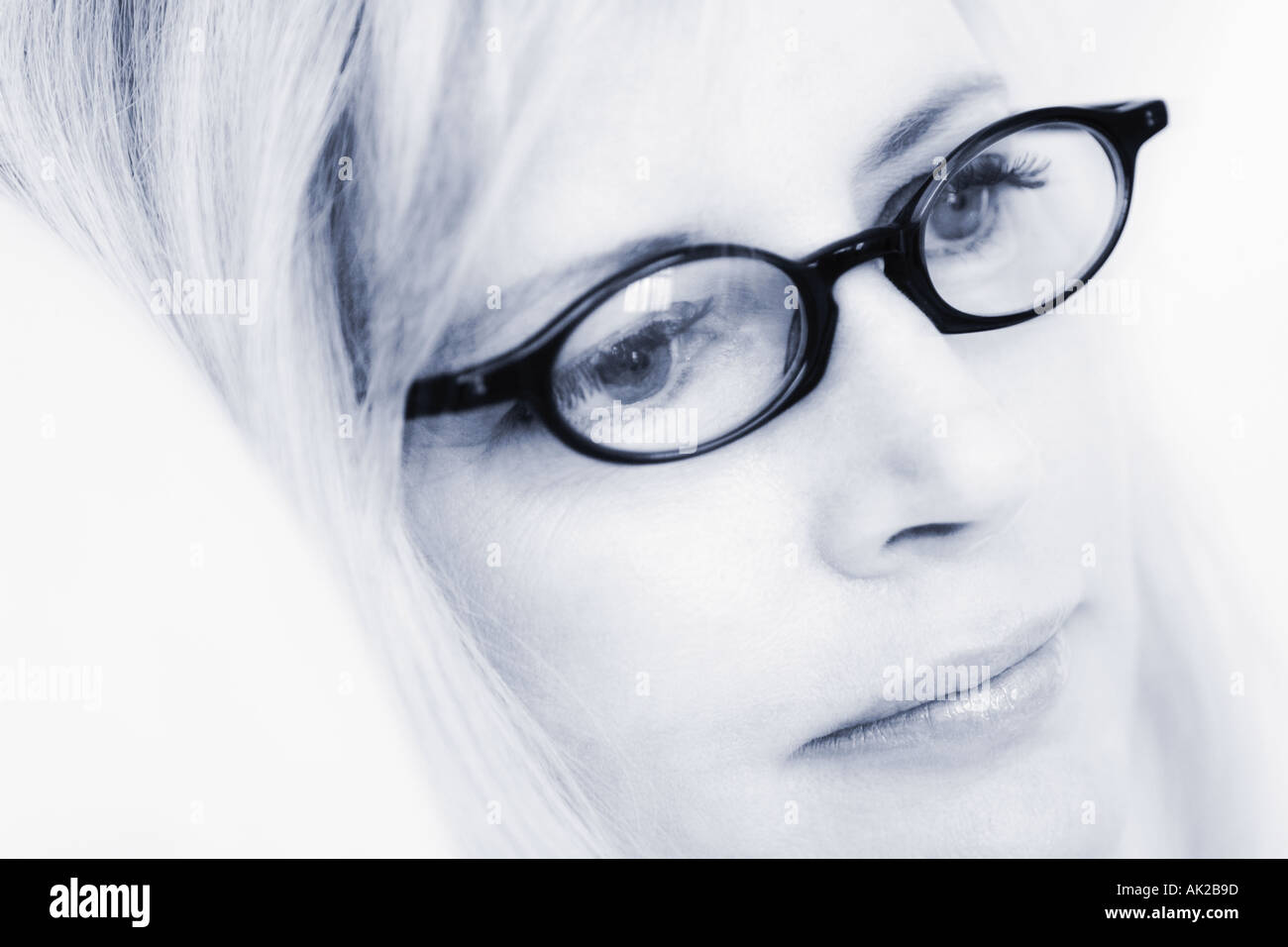 high key portrait of woman with black rimmed glasses Stock Photo - Alamy